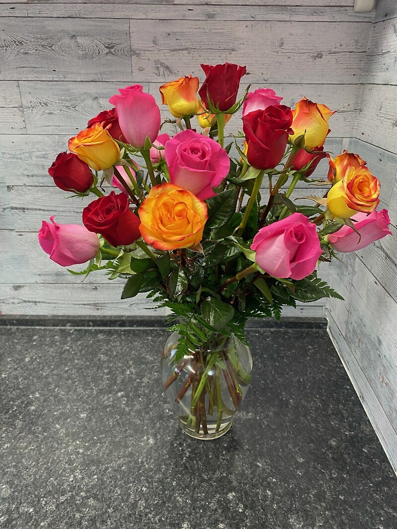 2 Dozen Mixed Color Roses arranged by a florist in National City, CA ...
